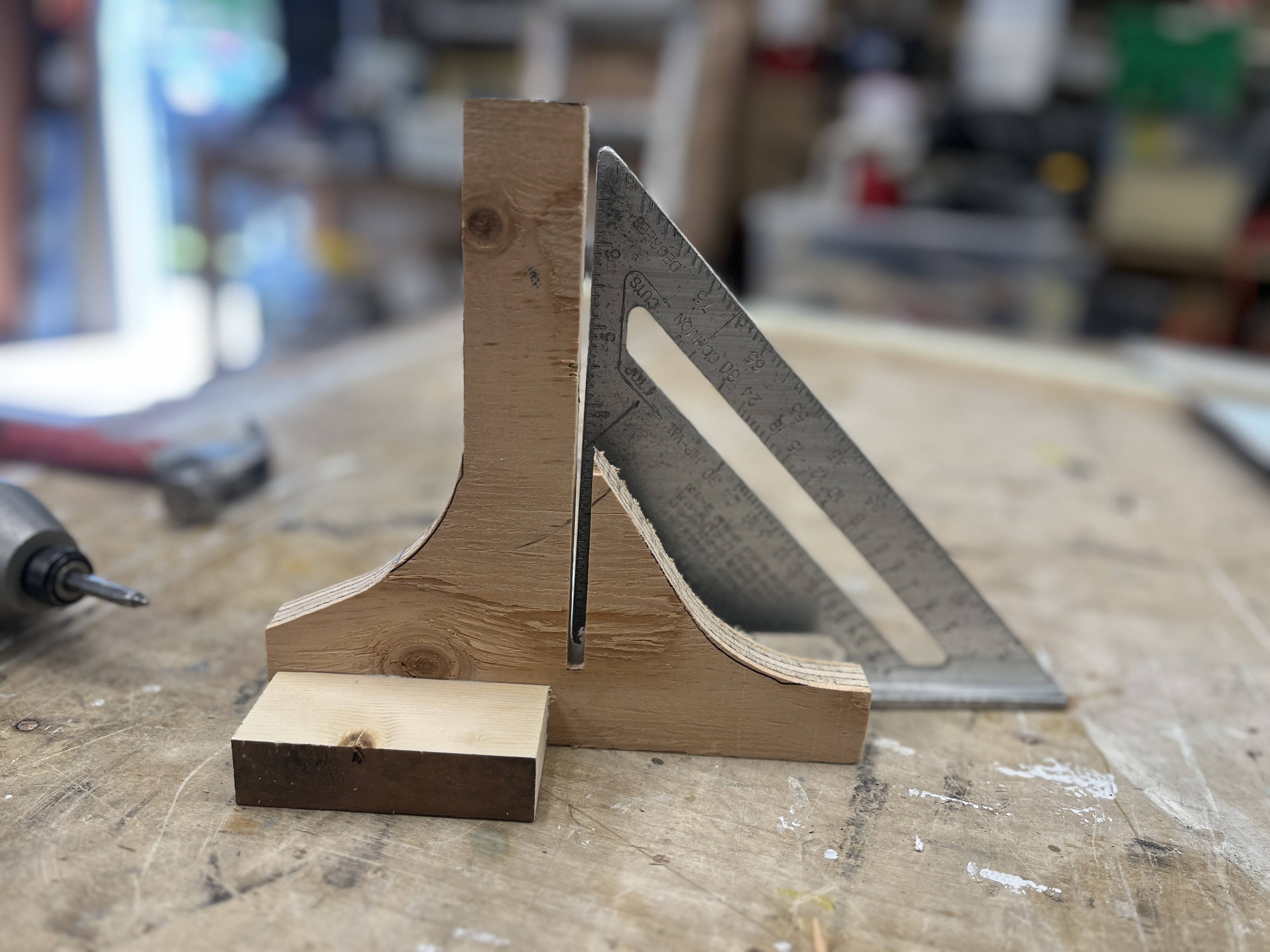 Simple plywood stands to hold foamcore 2D set pieces (flats)