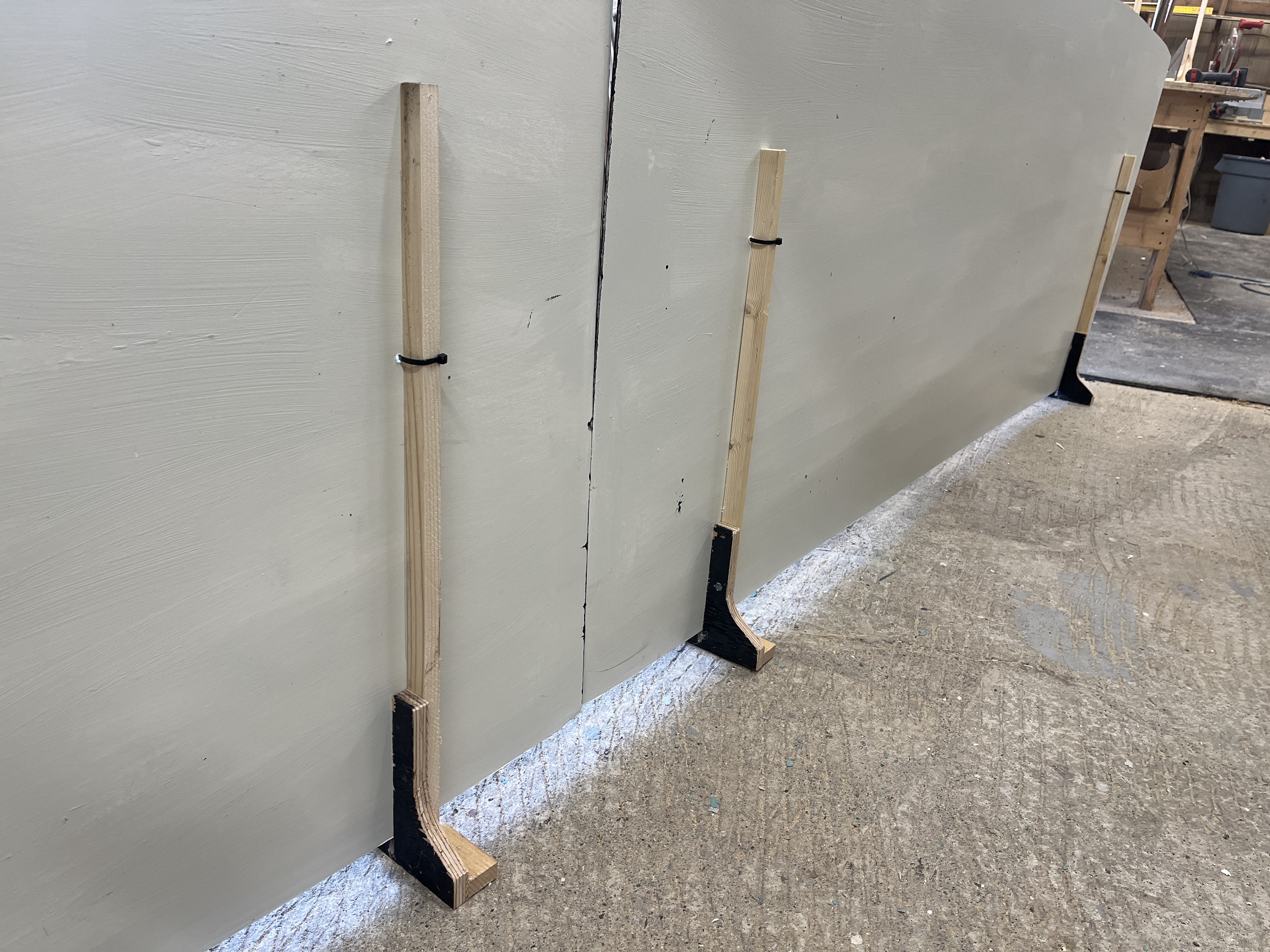 Simple plywood stands to hold foamcore 2D set pieces (flats)