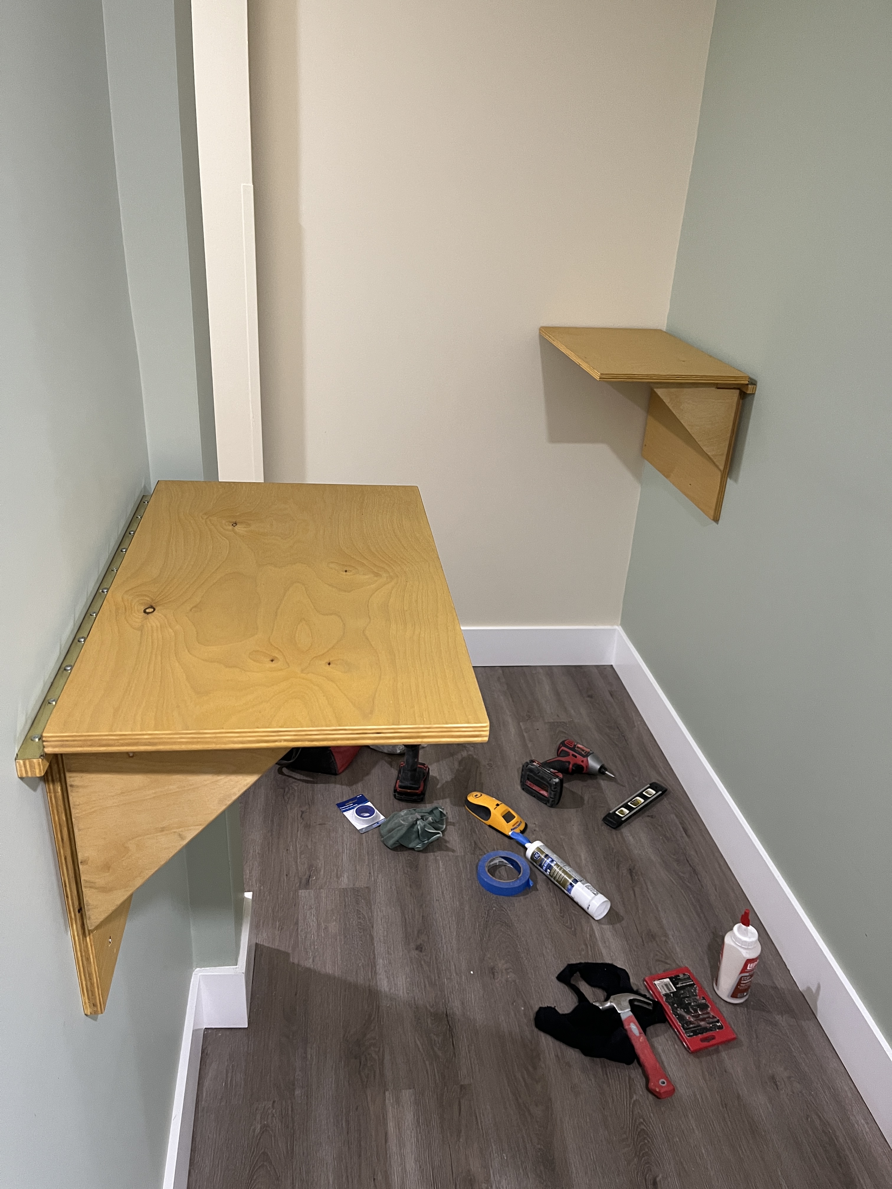 Custom fold-down, wall-mounted, low-tech, space-saving Tables